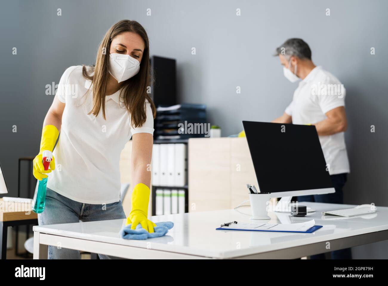 Cleaning Service Janitor Cleaner With Mop In Face Mask Stock Photo - Alamy