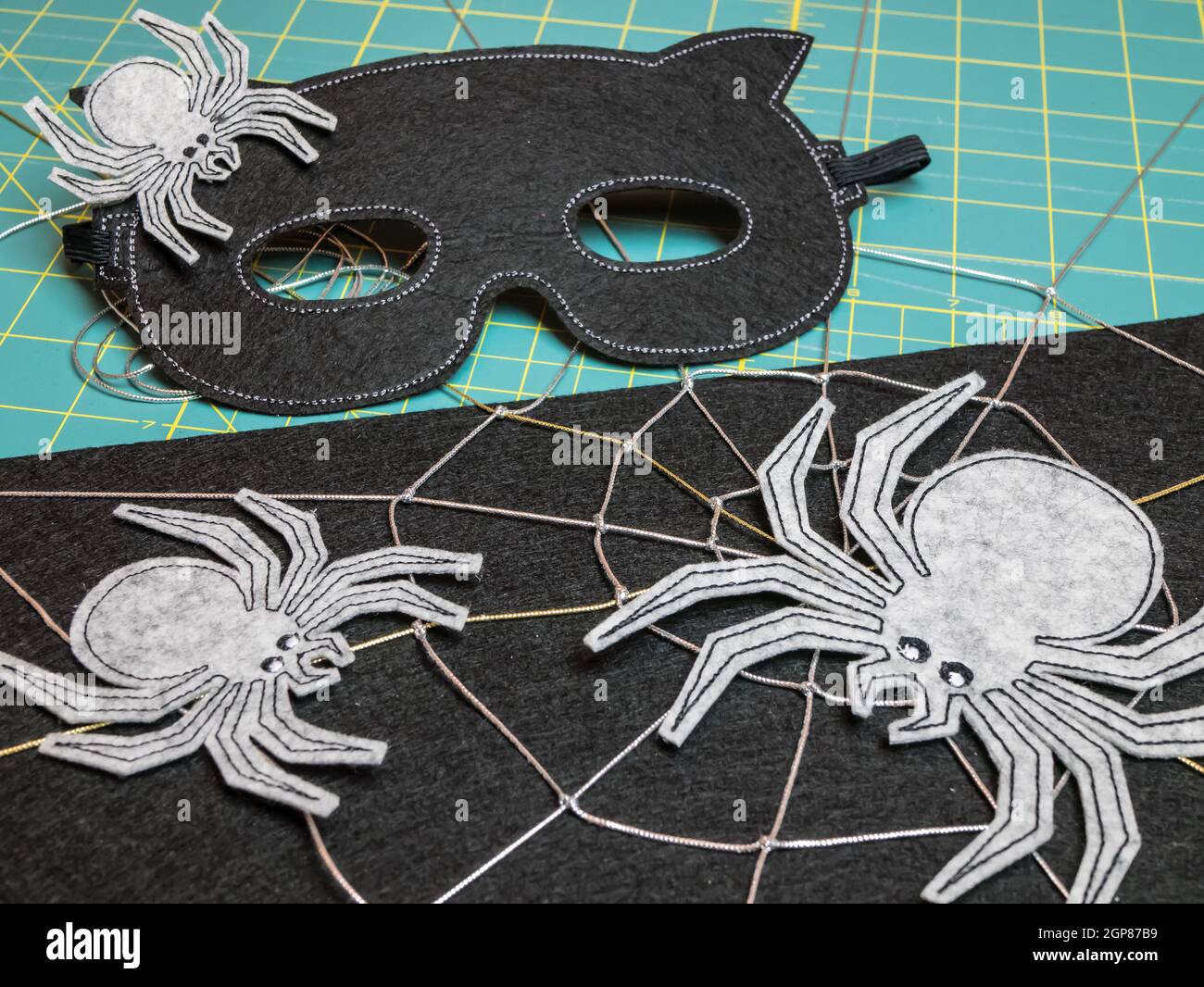 Mask and spiders from felt as the decoration for the Halloween Festival ...