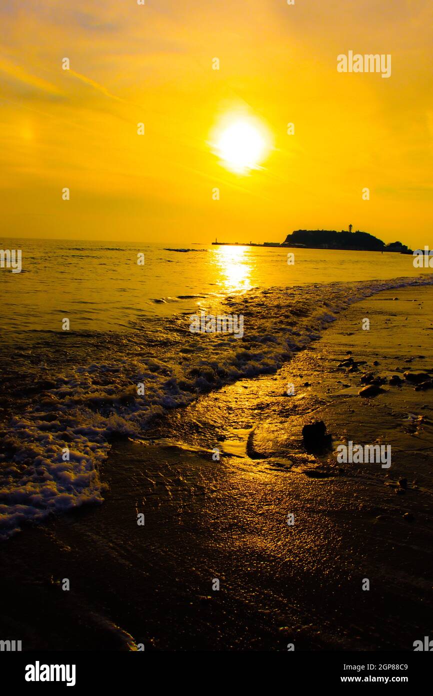 Kamakura coast illuminated in sunset. Shooting Location: Kamakura ...