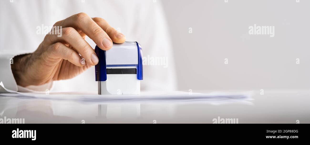 Approved Paper Document Stamp. Permit Rubber Stamper Stock Photo - Alamy