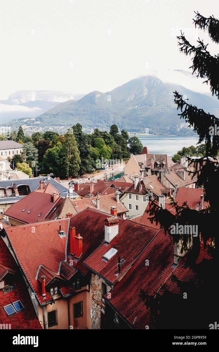 Annecy city top view, lake in the distance. Tile roofs, Cathedral. High ...