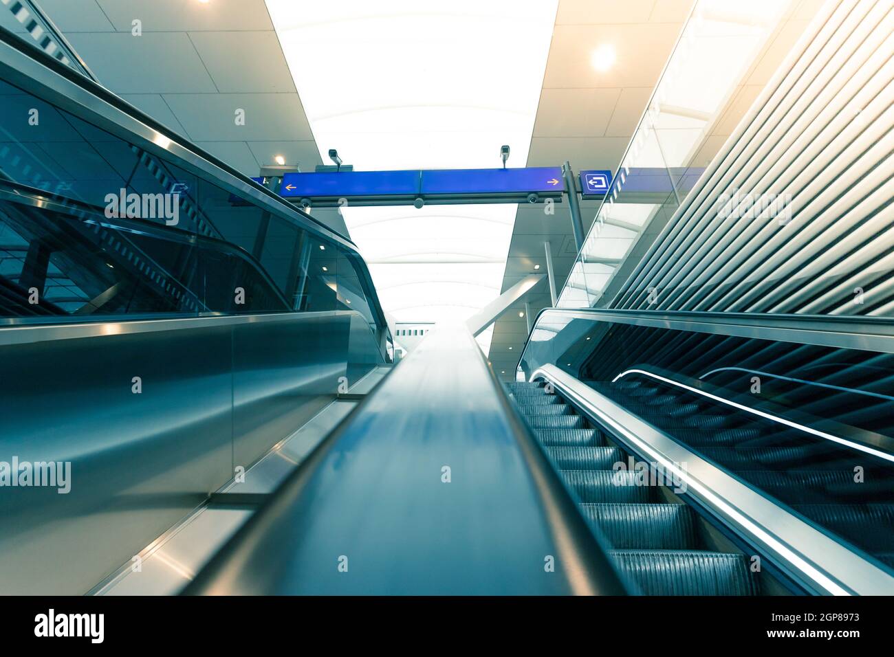 Travelling scene on train station, moving stairway for public transport ...