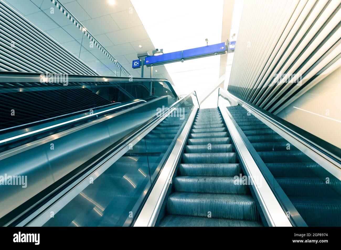 Travelling scene on train station, moving stairway for public transport ...