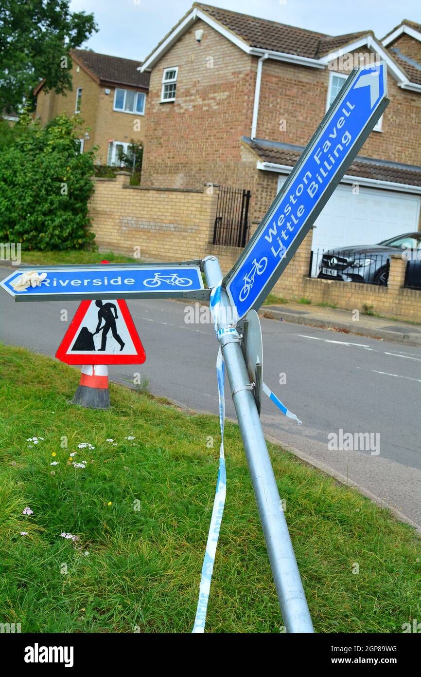 Street signs damaged in RTC car crash England Uk Stock Photo - Alamy