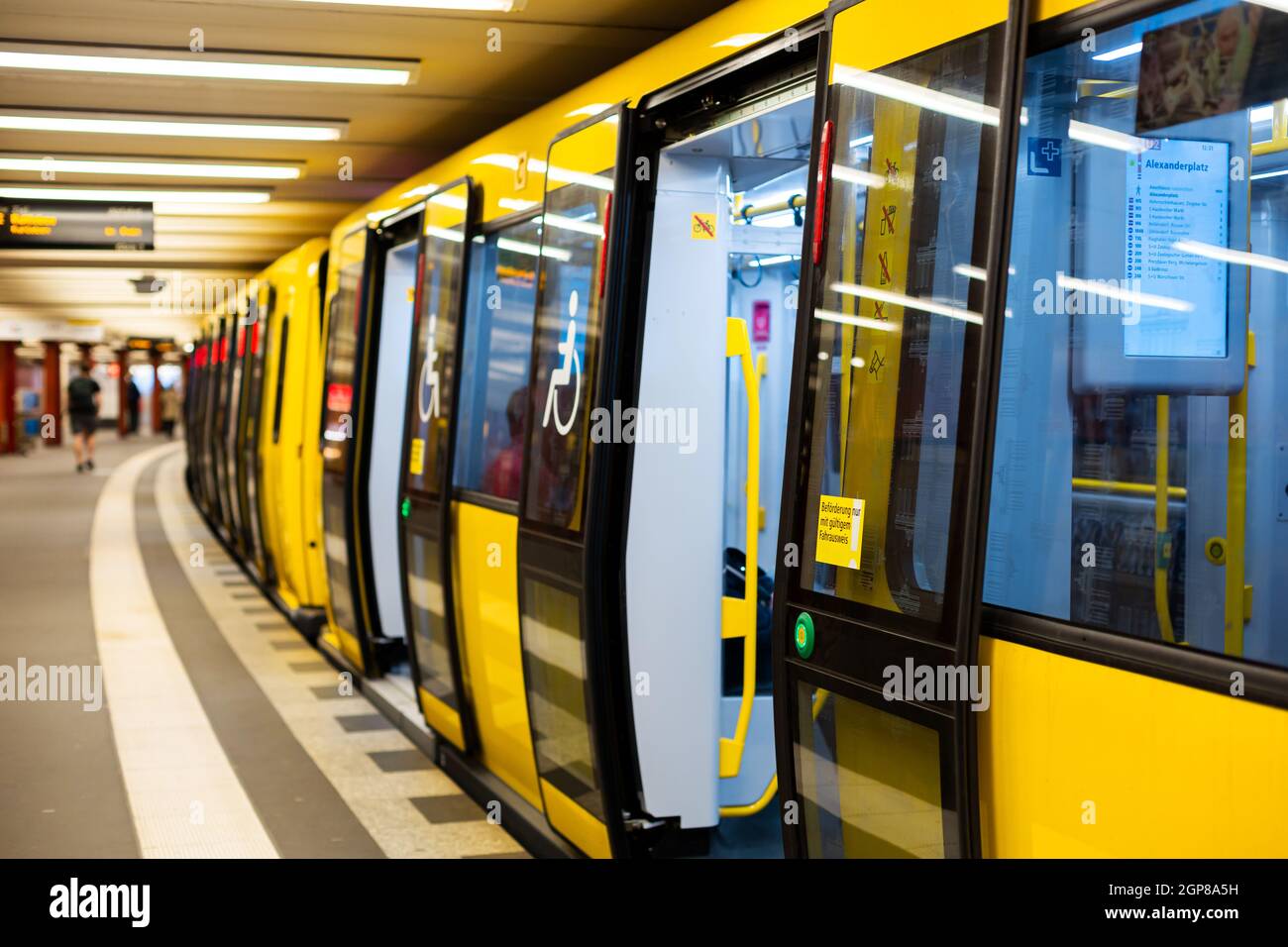 Modern subway. Yellow train at the station Stock Photo - Alamy