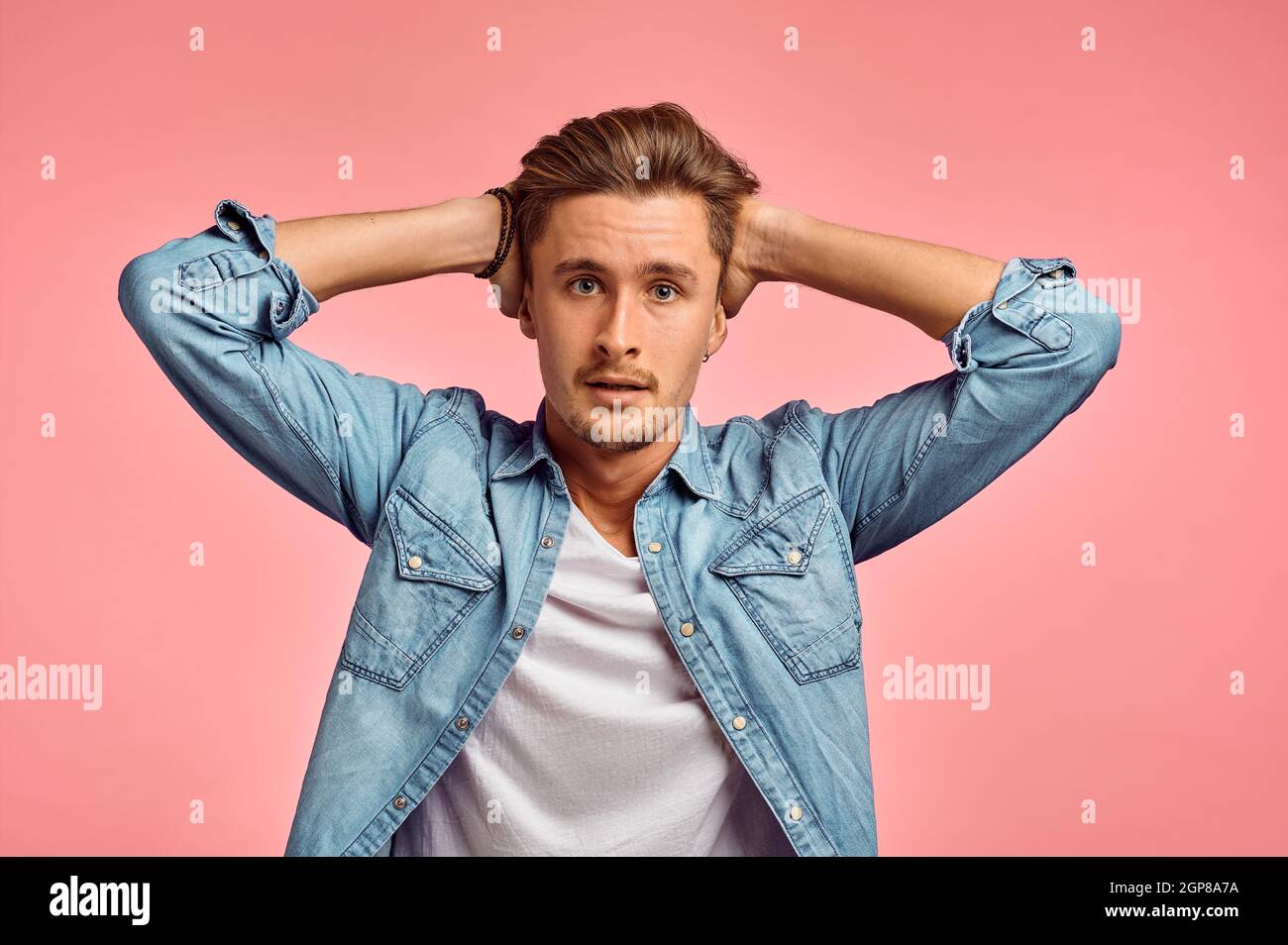 Stressed man portrait, pink background, emotion. Face expression, male ...