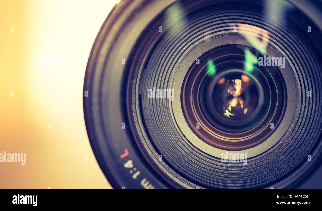 Close up picture of a professional optic photo lens. Smooth blurry ...