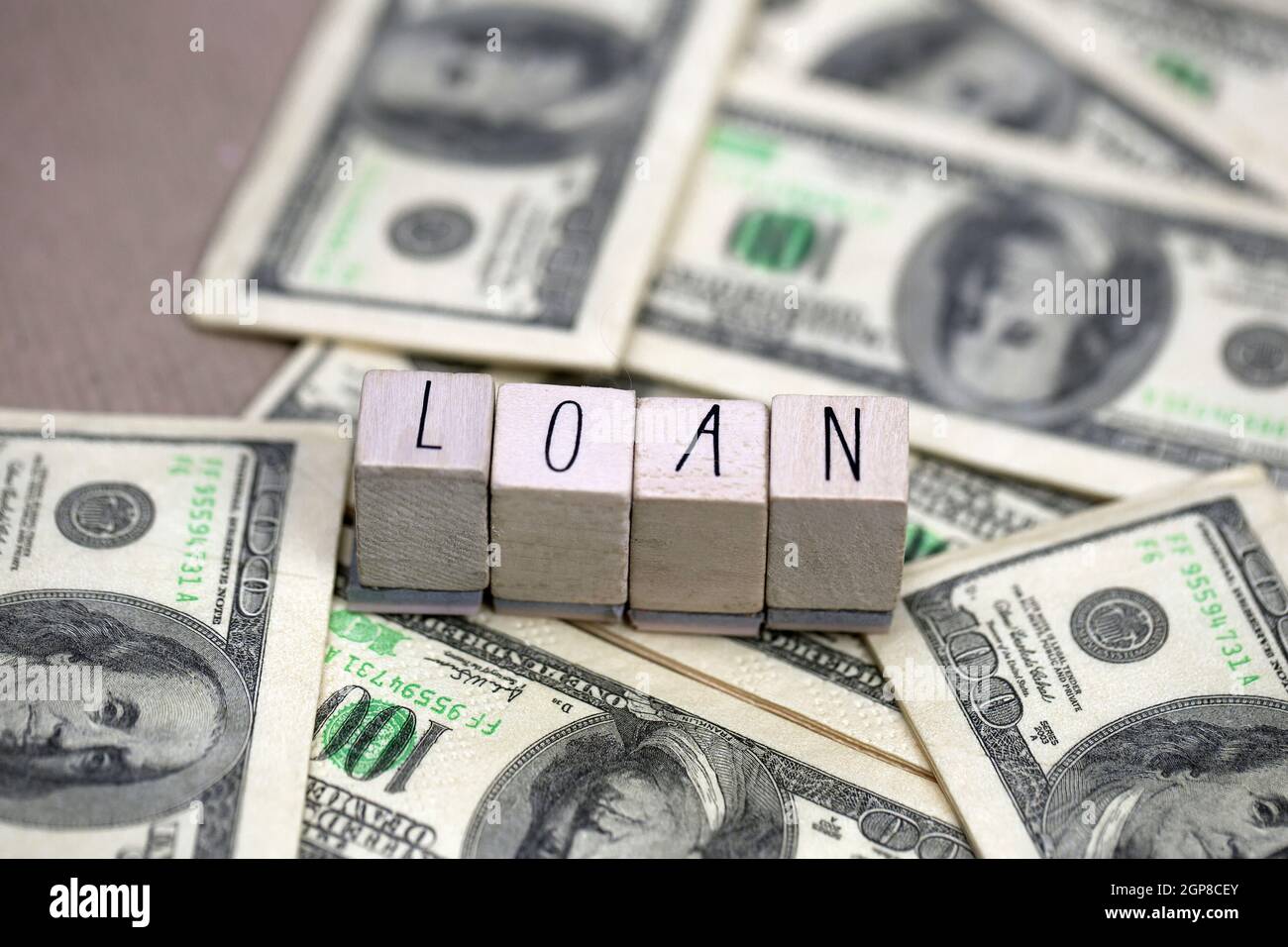 Word Loan with hundred dollar bills, business and finance concept, for ...