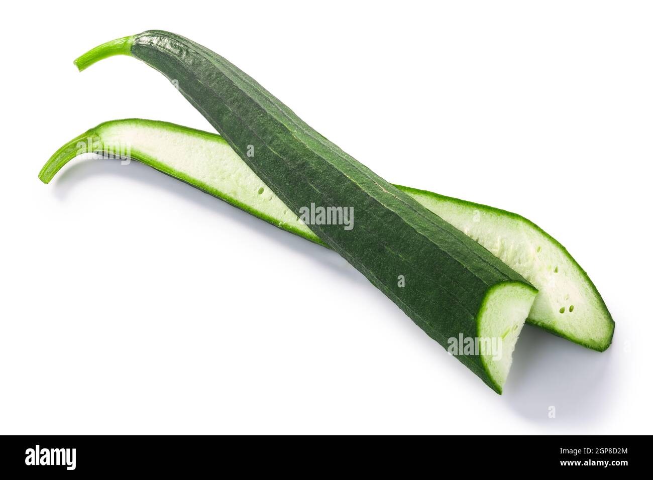 Fresh immature Luffa (Luffa acutangula pepo fruit), cut in half ...