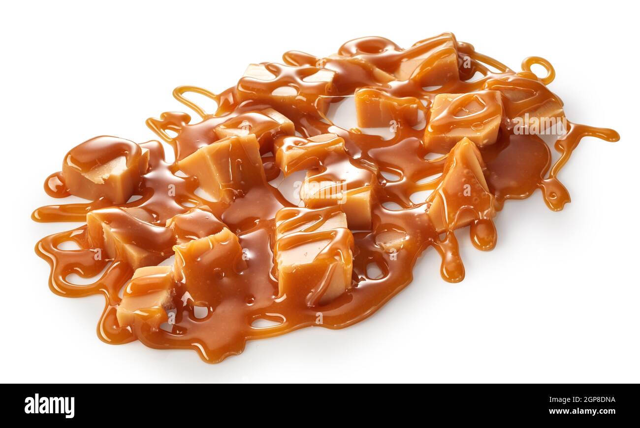 Splash of caraSplash of caramel sauce with fudge candies and sprinkles ...