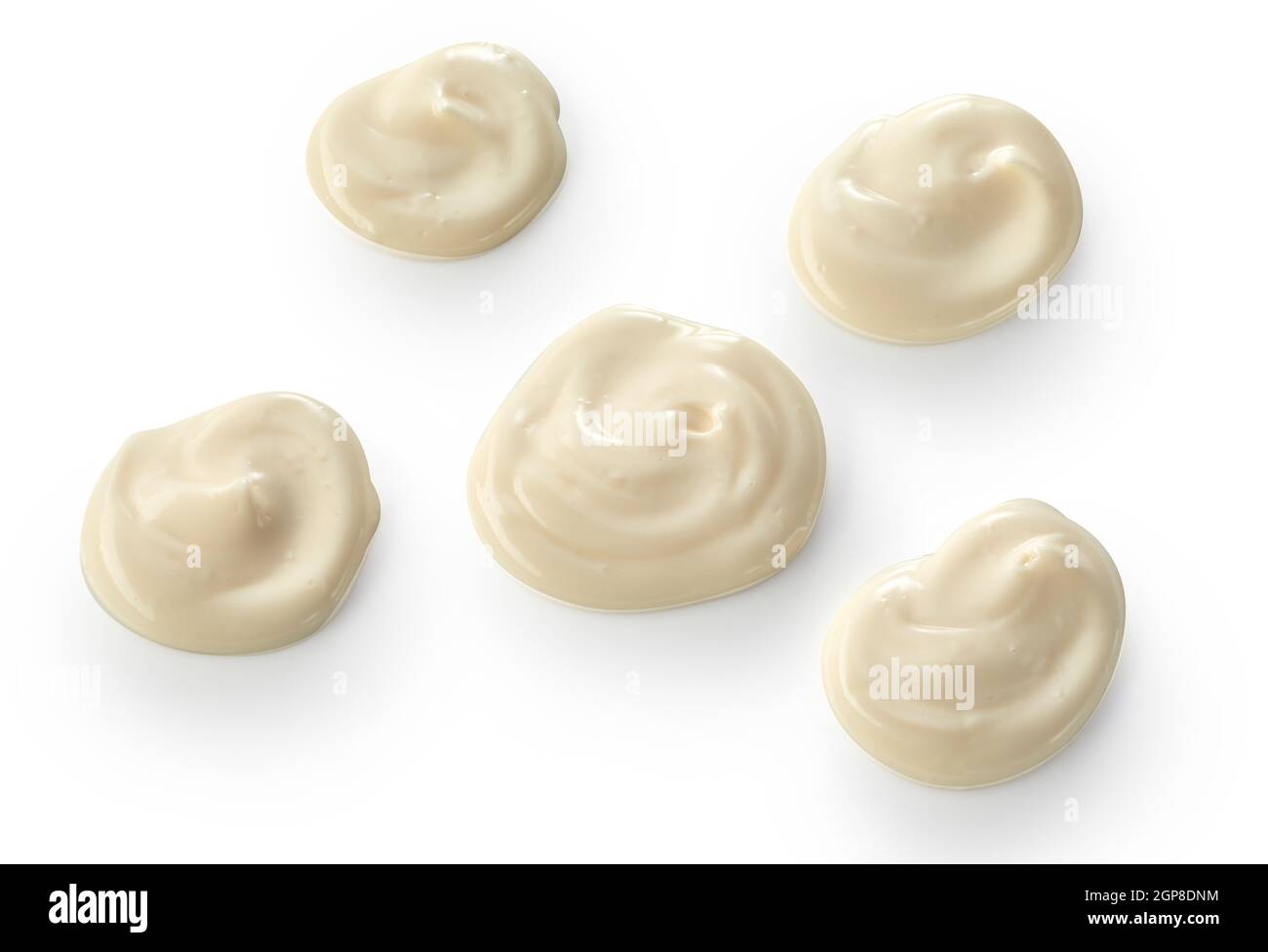 Decorative blobs of swirled mayonnaise in different patterns isolated ...