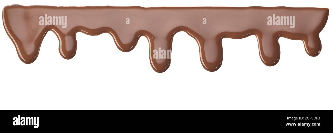 Strip of smooth chocolate drips flowing from the top isolated on white ...