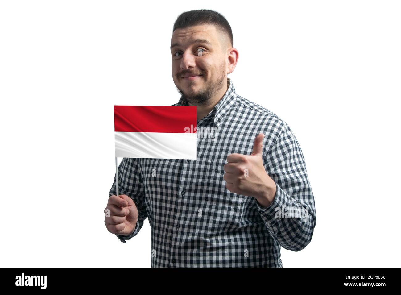 White guy holding a flag of Monaco and shows the class by hand isolated ...