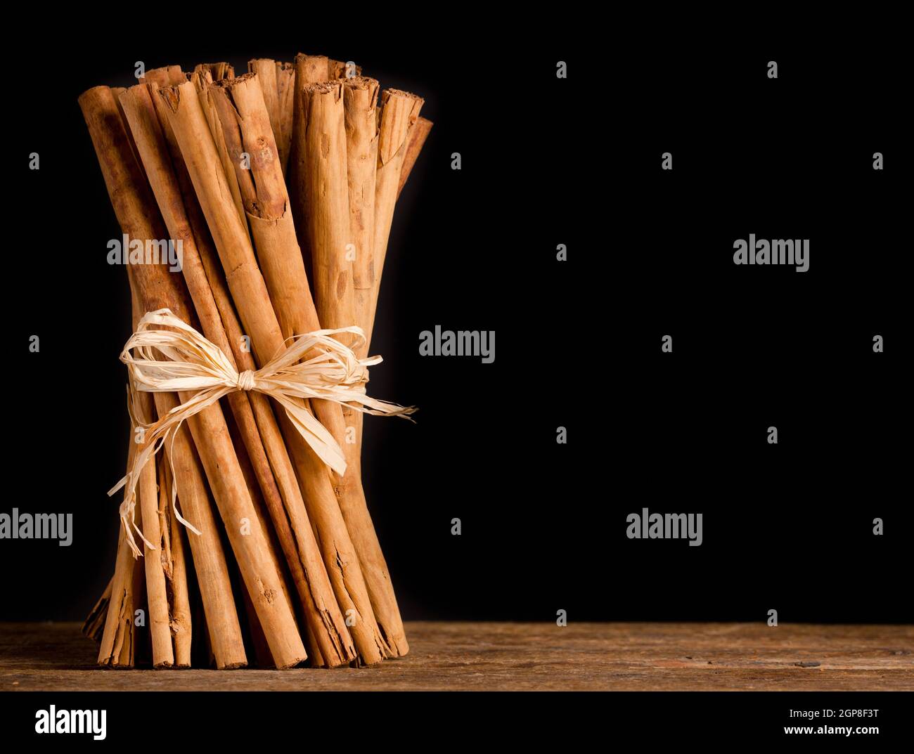 Bunch of Ceylon cinnamon on black background Stock Photo - Alamy