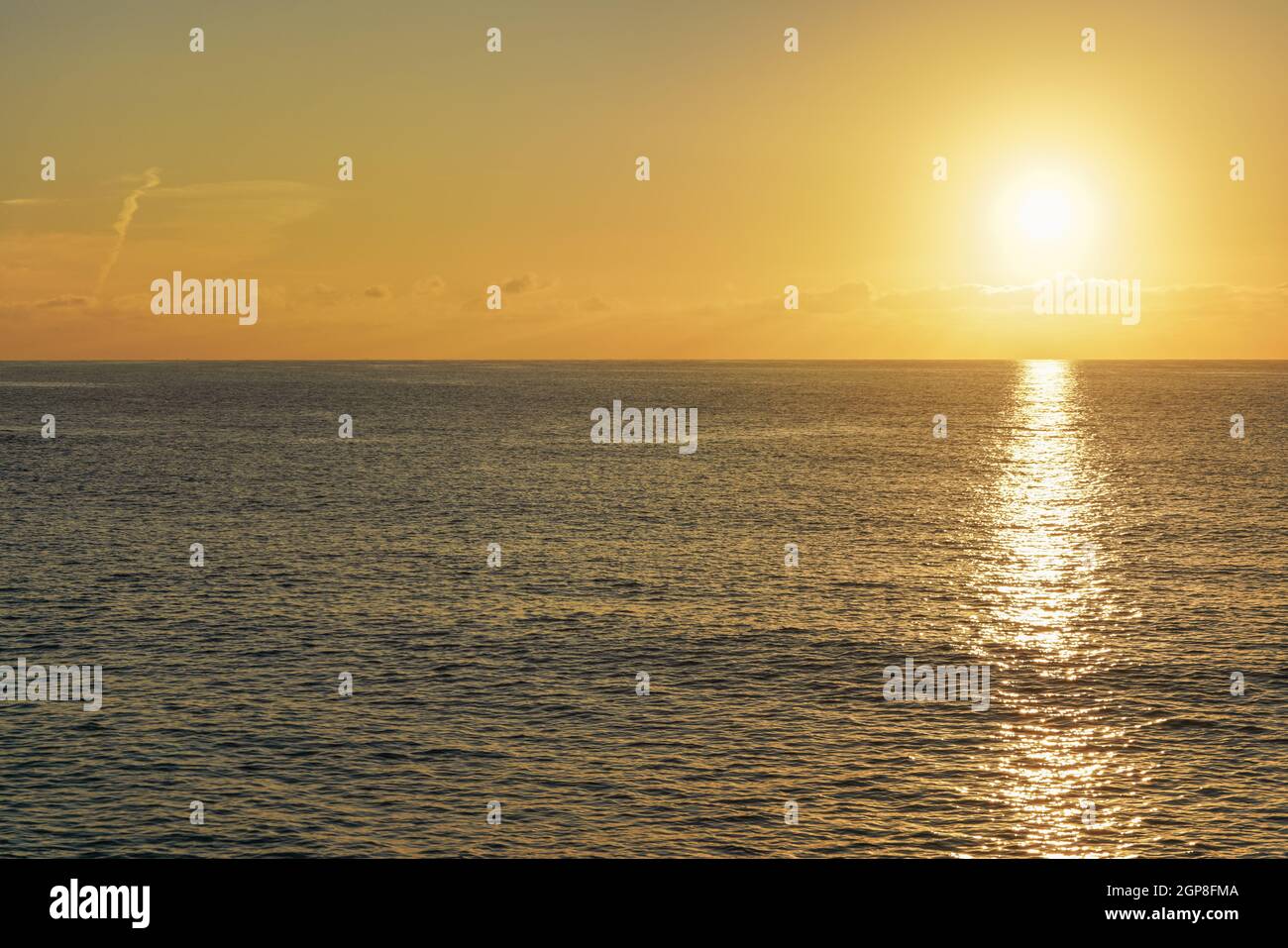 Golden sun rising above hi-res stock photography and images - Alamy