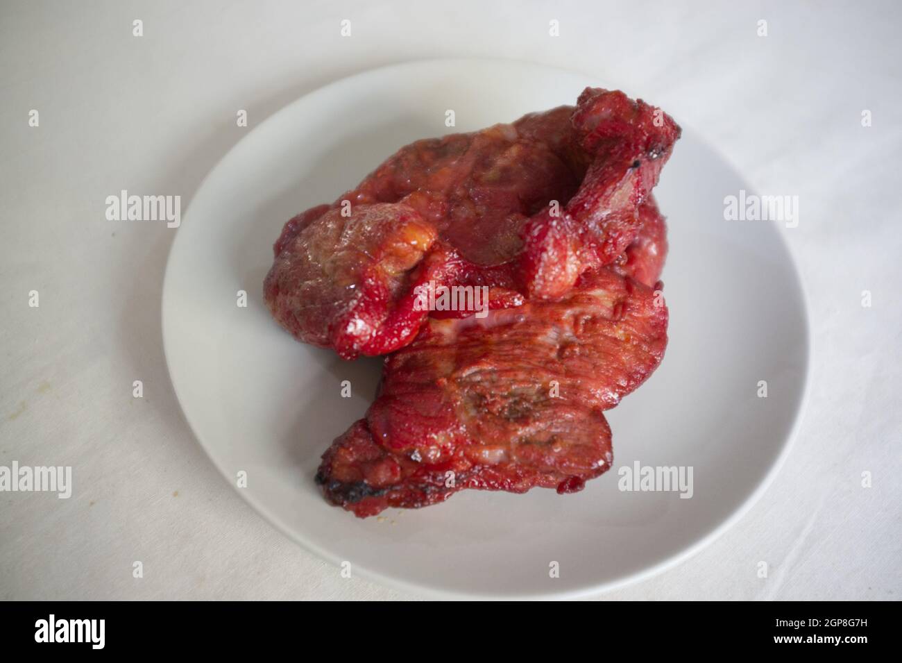 Roasted red pork on dish , THAI cuisine , Chinese food Stock Photo - Alamy