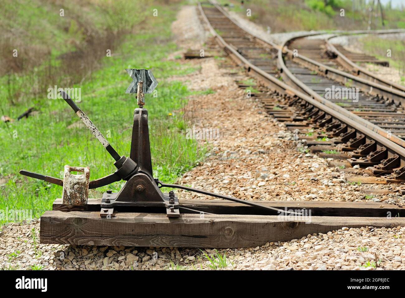 Old railroad mechanical switch with old railway Stock Photo - Alamy