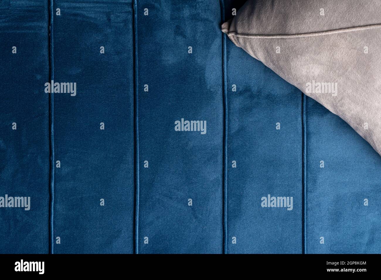 Close up velvet sofa texture, velvet couch background with gray cushion ...