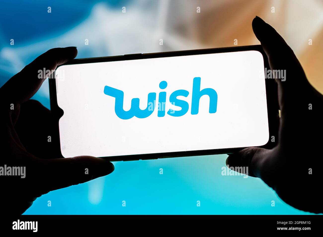 In this photo illustration, a Wish logo seen displayed on a smartphone ...