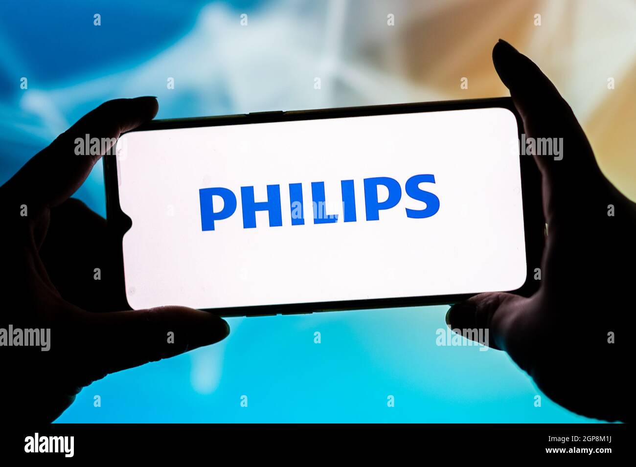 In this photo illustration, a Philips logo seen displayed on a ...