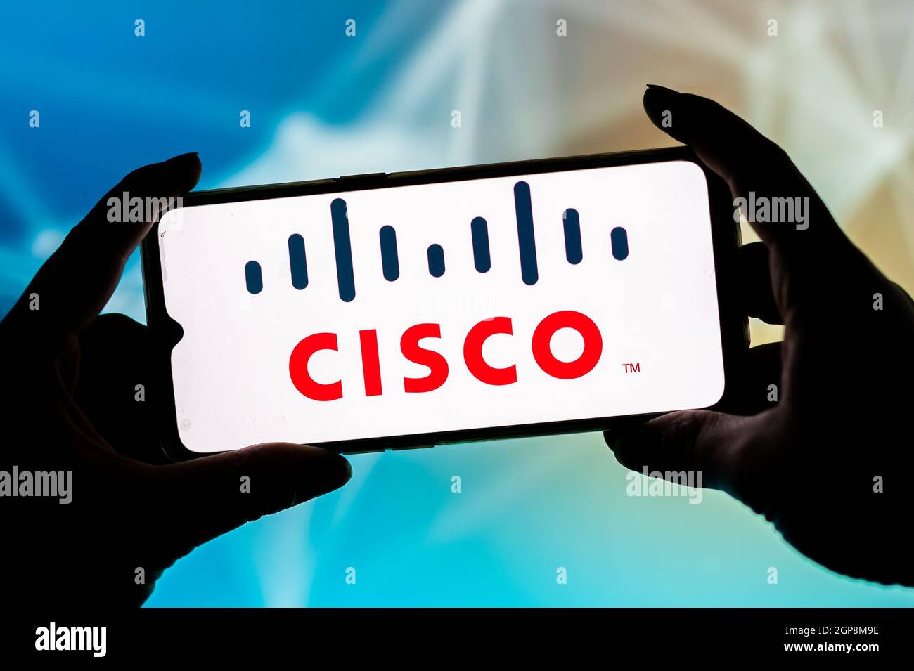 In this photo illustration, a Cisco logo seen displayed on a smartphone ...