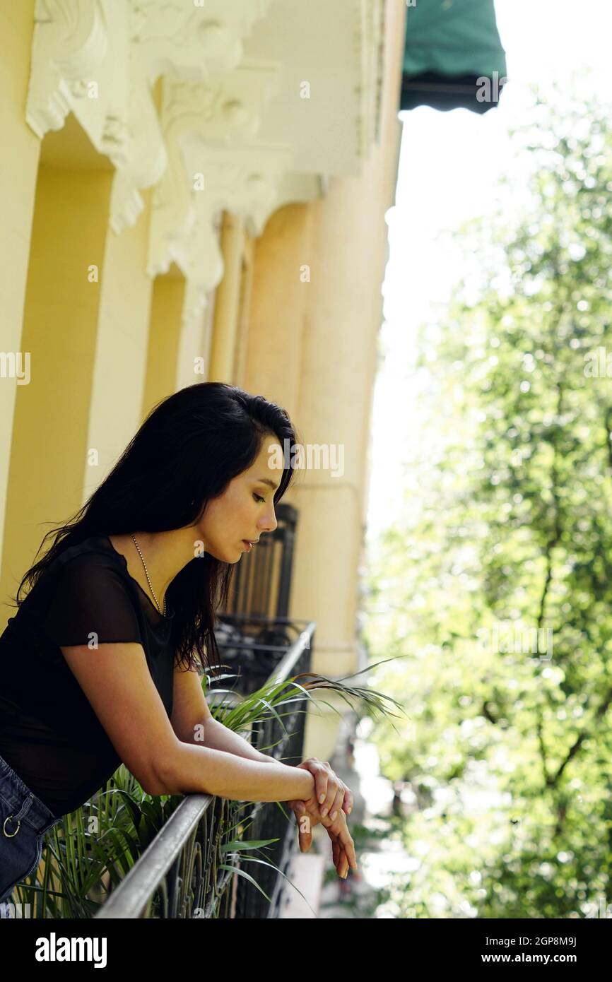 Woman Looking Down From Balcony High Resolution Stock Photography and ...