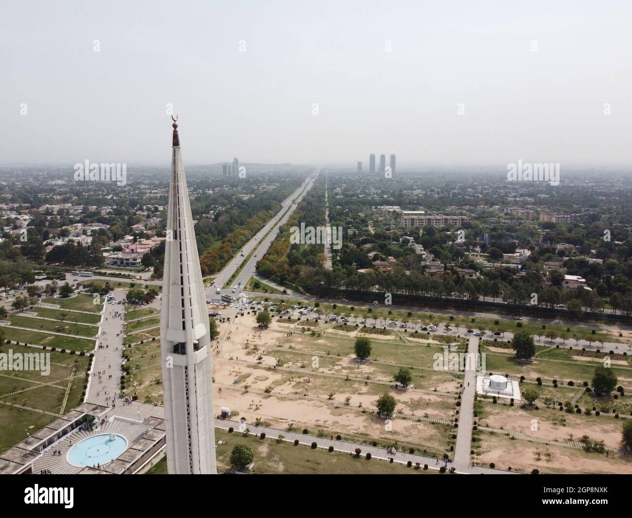 Aerial view of a town and a white super-high tower during the day Stock ...