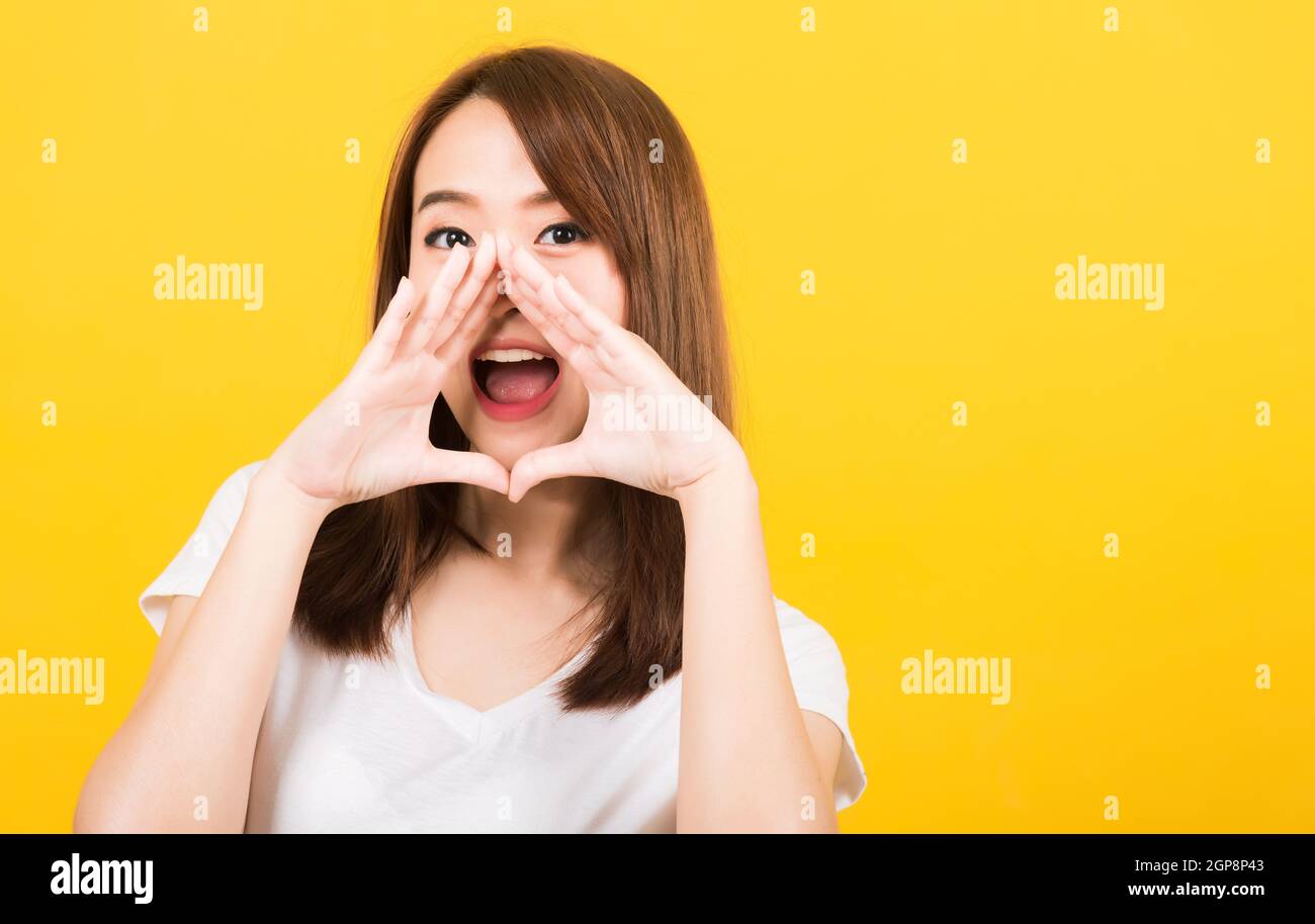 Asian happy portrait beautiful cute young woman teen standing big shout ...