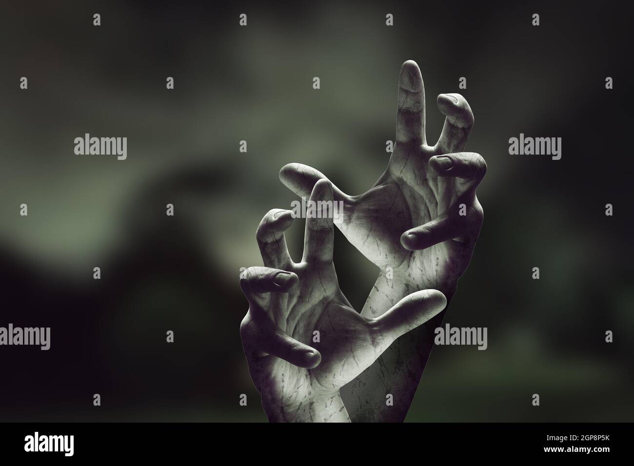 Closeup of two creepy hands rising from below in a creepy setting Stock ...