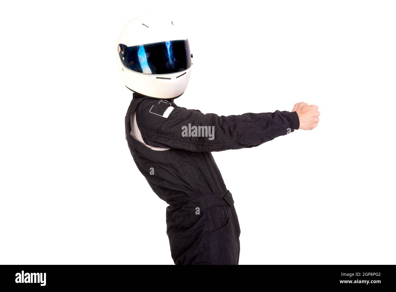 Racing driver posing with helmet isolated in white Stock Photo - Alamy