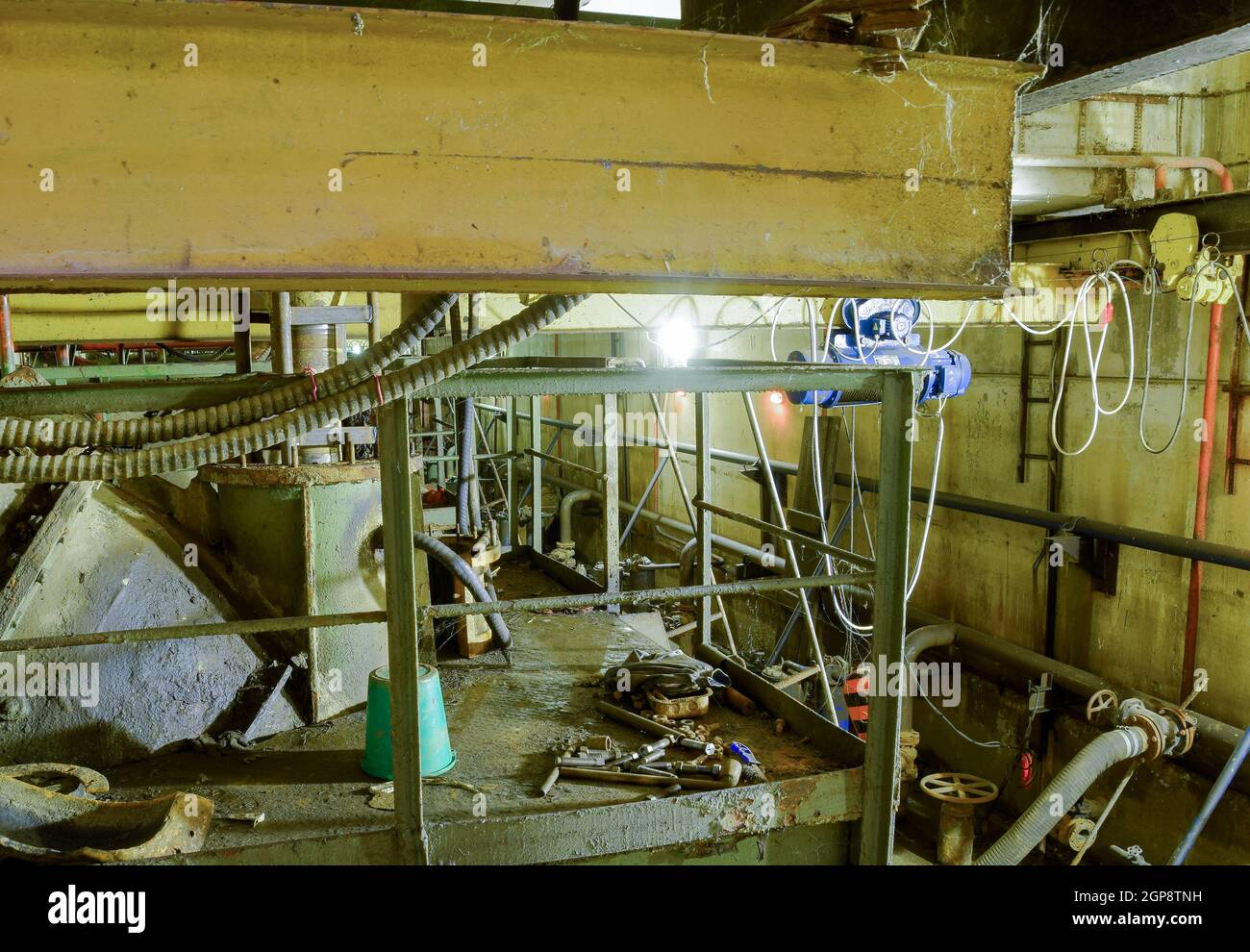 Basement of a water pumping station. Abandoned post-apocalyptic view of ...