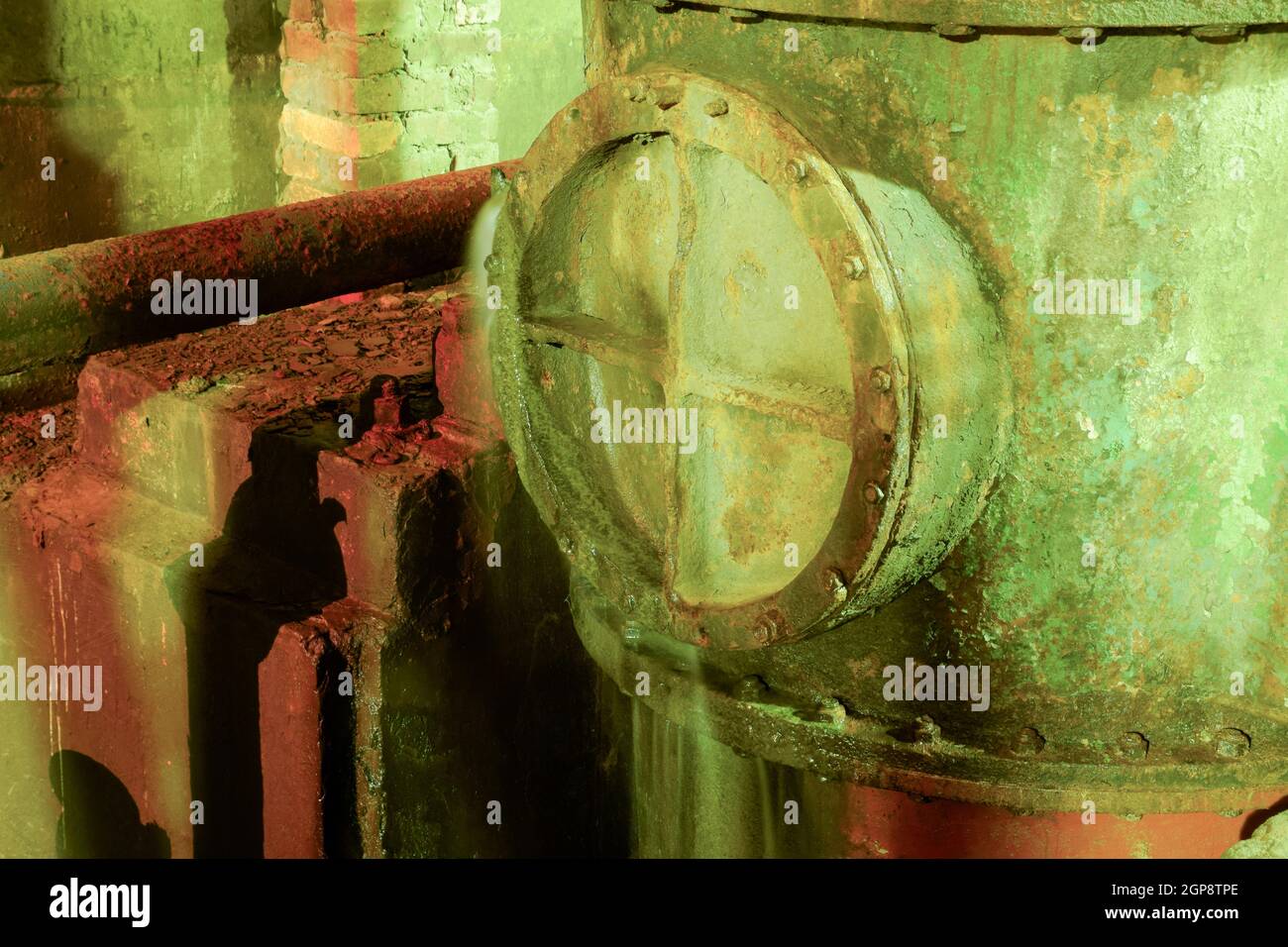 Basement of a water pumping station. Abandoned post-apocalyptic view of ...