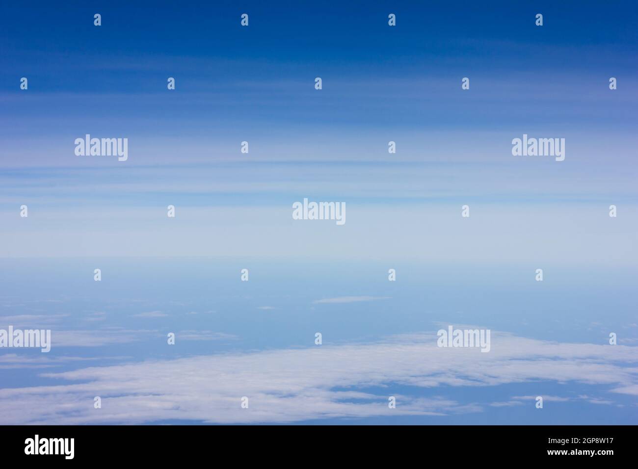Sky and clouds bird's eye view on the plane Stock Photo - Alamy