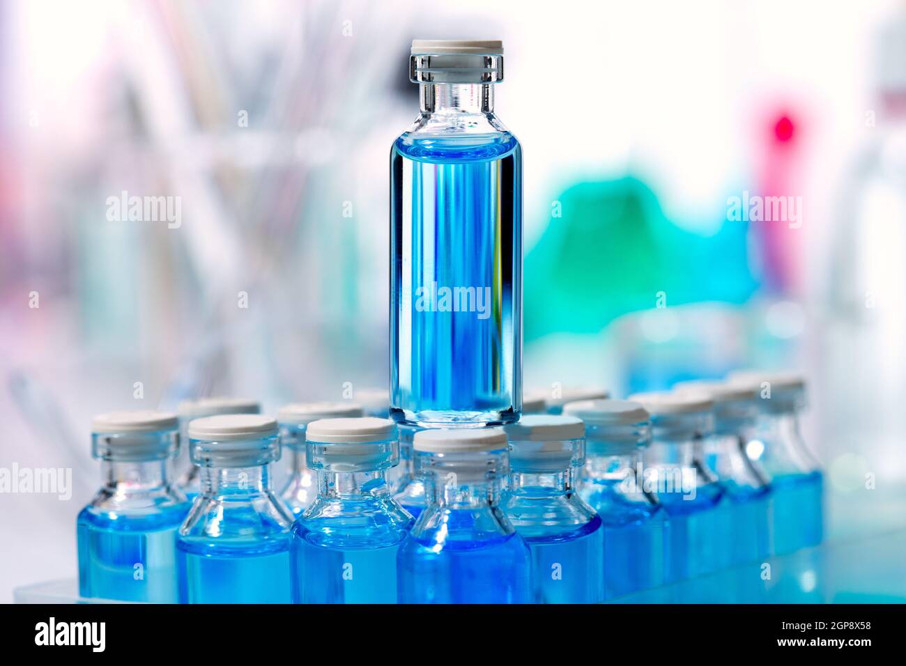 Chemical scientific laboratory stuff test tube and blue glass bottles ...