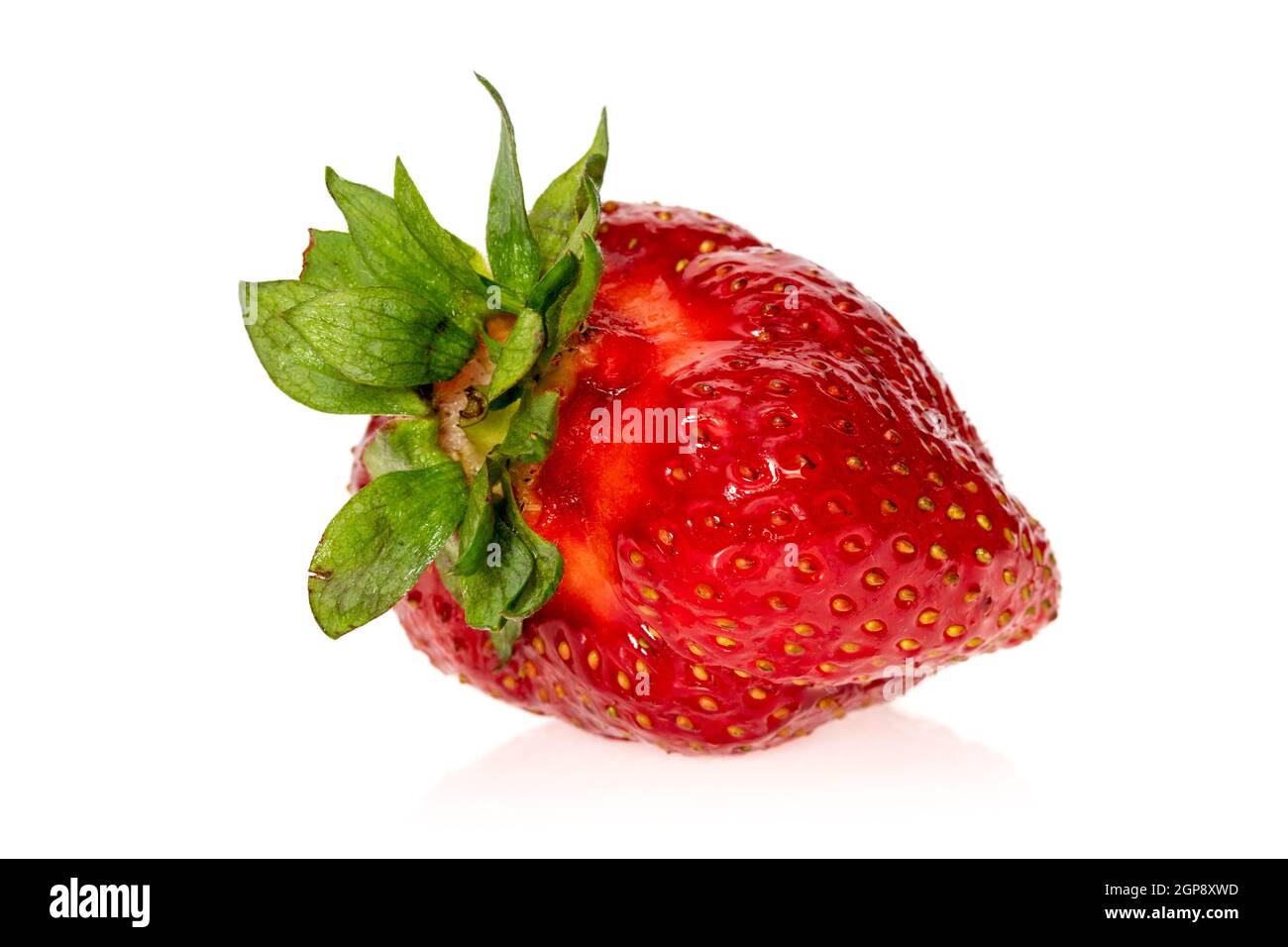 Non-ideal organic strawberry isolated on white background Stock Photo ...