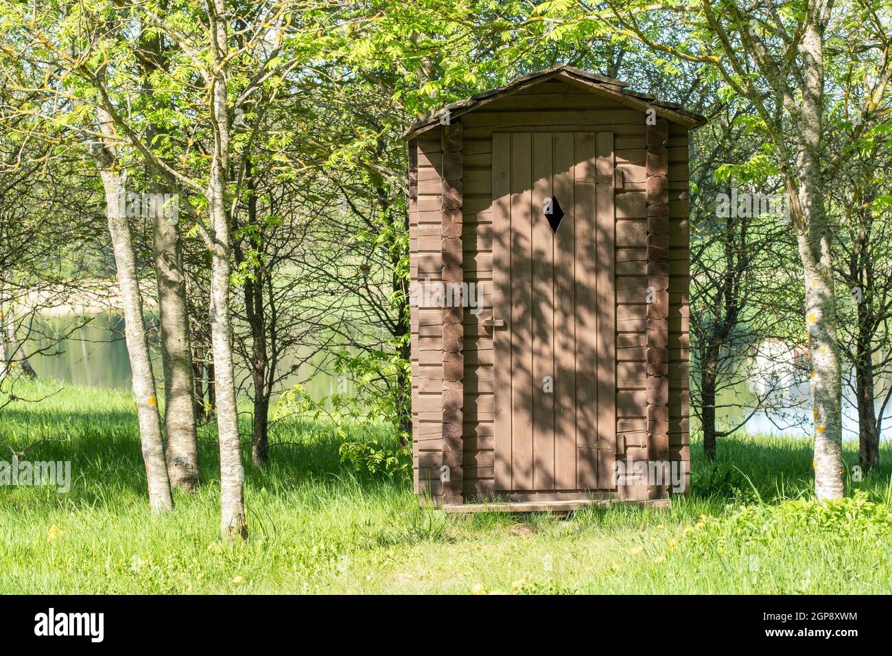 Wooden outhouse for tourists at a forest Stock Photo - Alamy