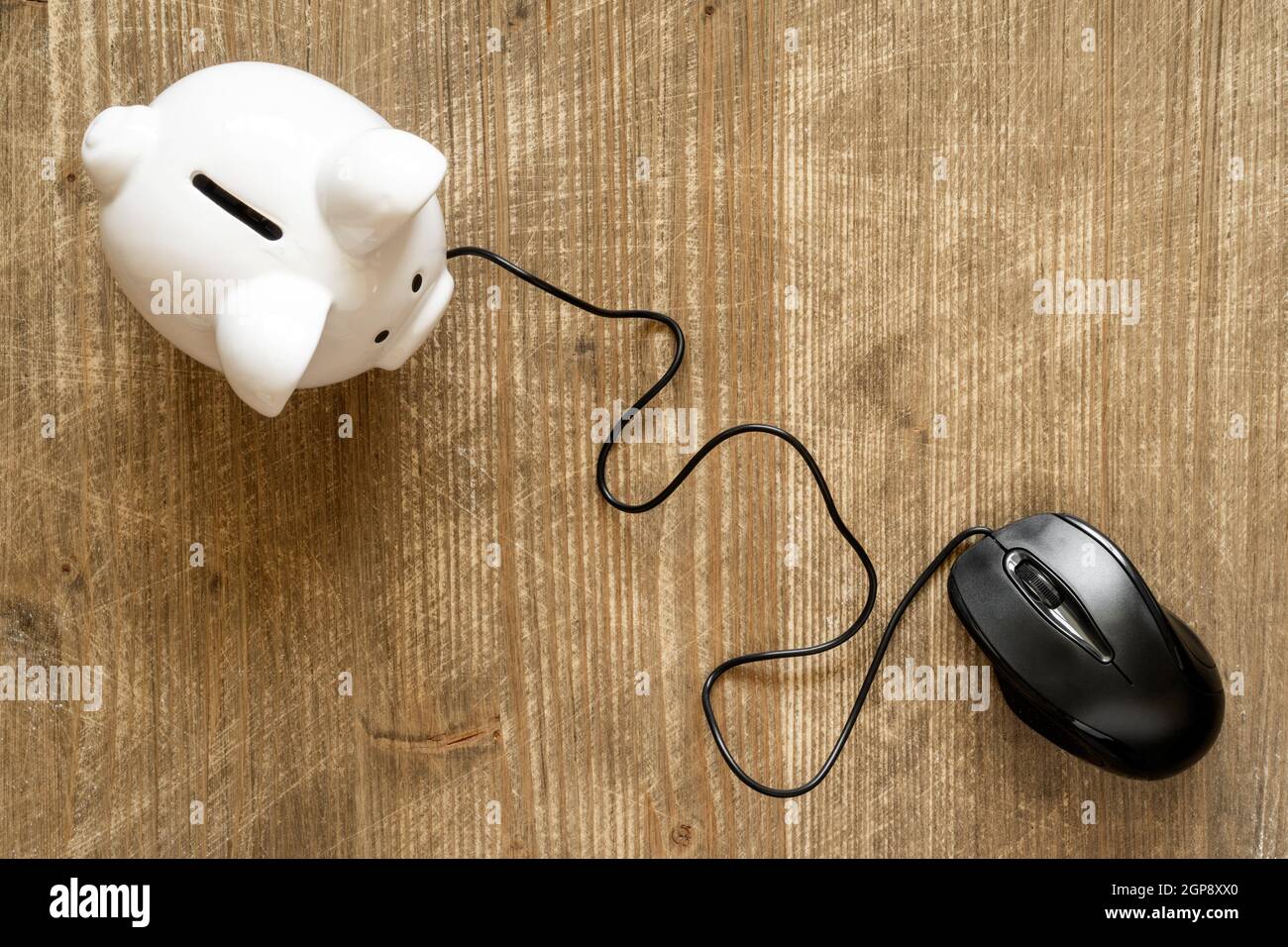 Online banking concept. Piggy bank with computer mouse Stock Photo - Alamy