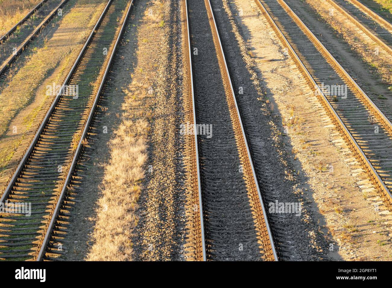 Railway tracks in a sunny day,view from above Stock Photo - Alamy