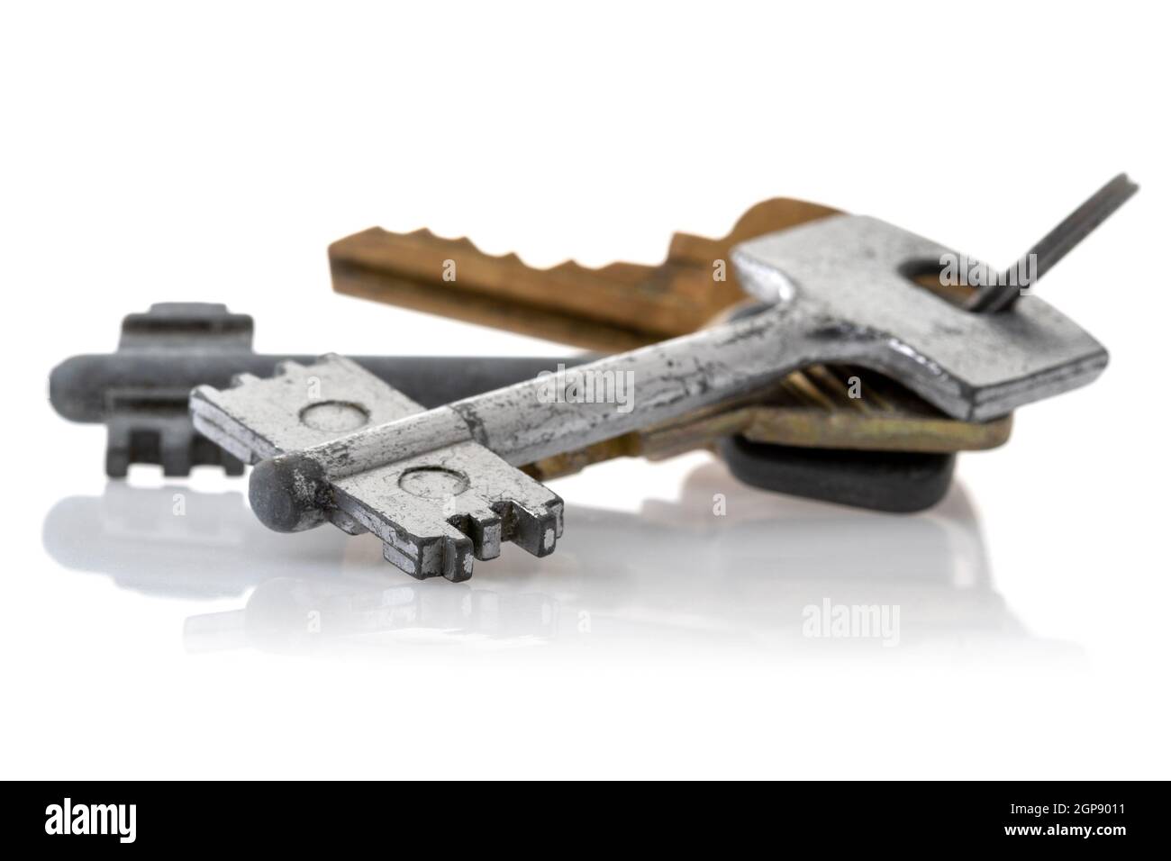 Bunch of keys isolated on white background Stock Photo - Alamy