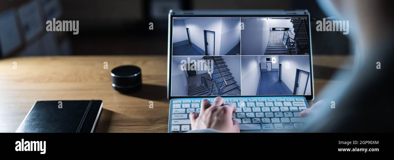 Watching CCTV Video Camera Footage On Computer Screen Stock Photo - Alamy