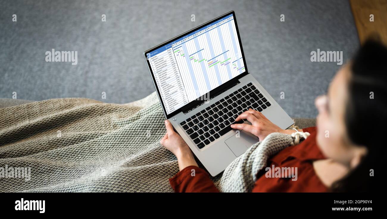 Business Report Time Sheet Gantt Schedule On Computer Stock Photo - Alamy