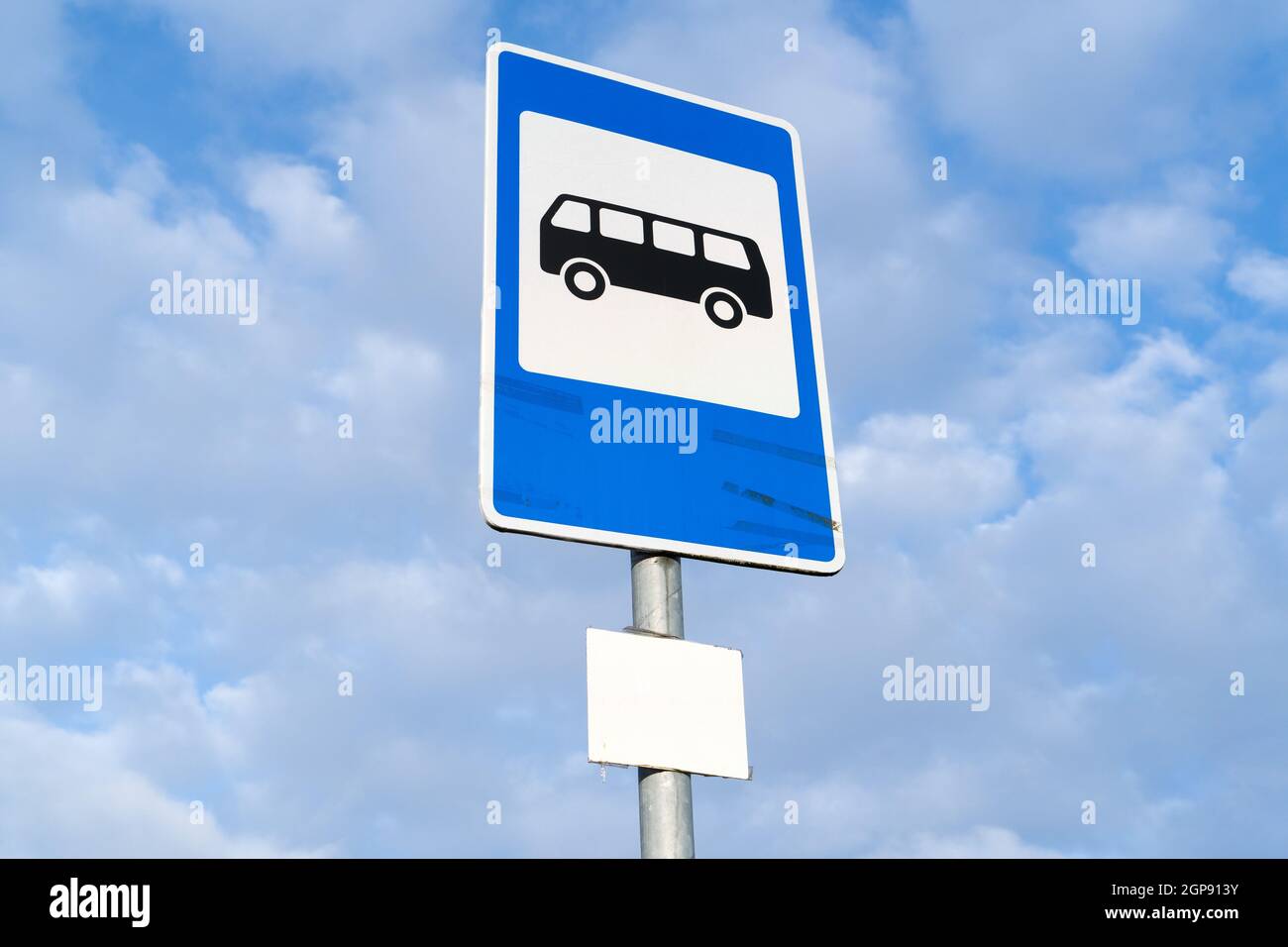 Blue and white bus stop sign in Europe with sky background Stock Photo ...