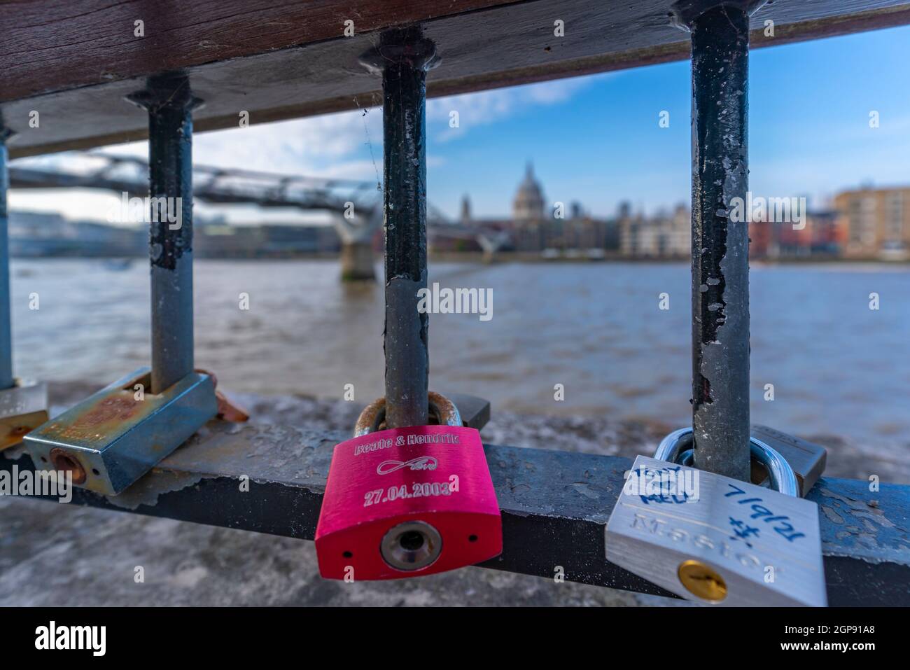View of St Paul's Cathedral, river Thames and love locks, London ...