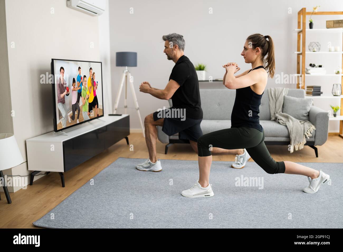 Online TV Home Fitness Workout And Exercise Stock Photo - Alamy