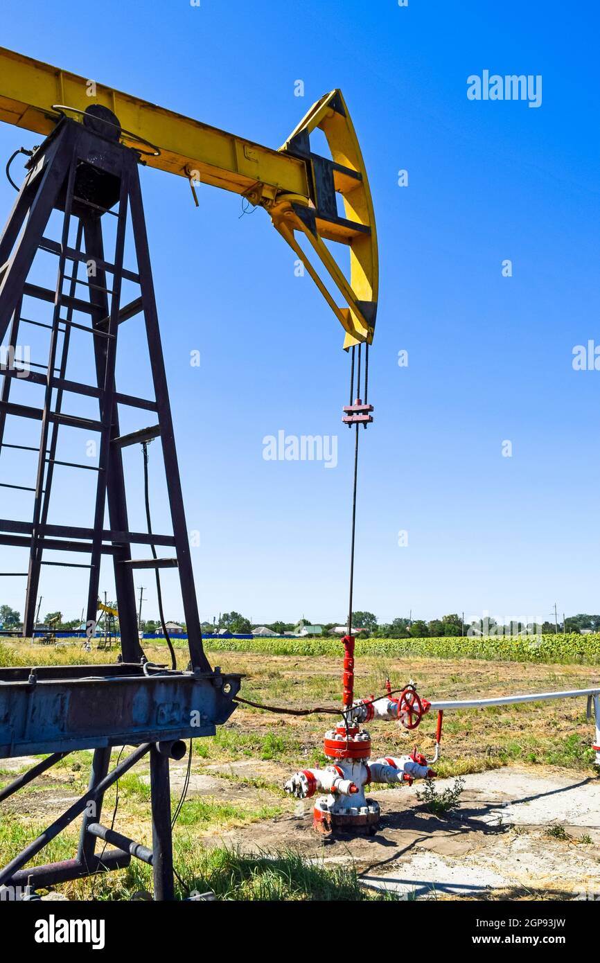 The pumping unit as the oil pump installed on a well. Equipment of oil ...