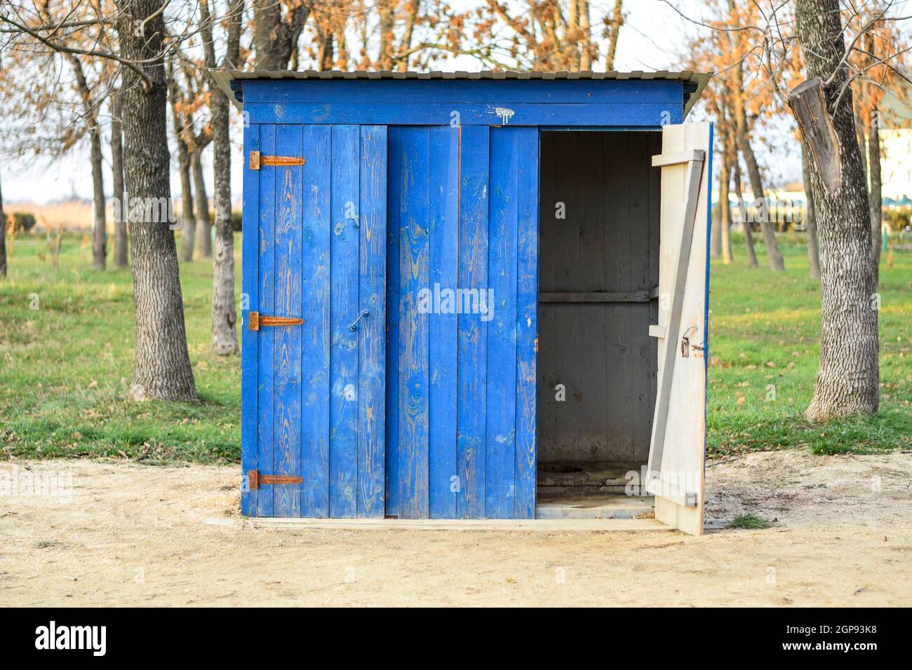 Public toilet in a street park. Blue wooden toilet, restroom Stock ...