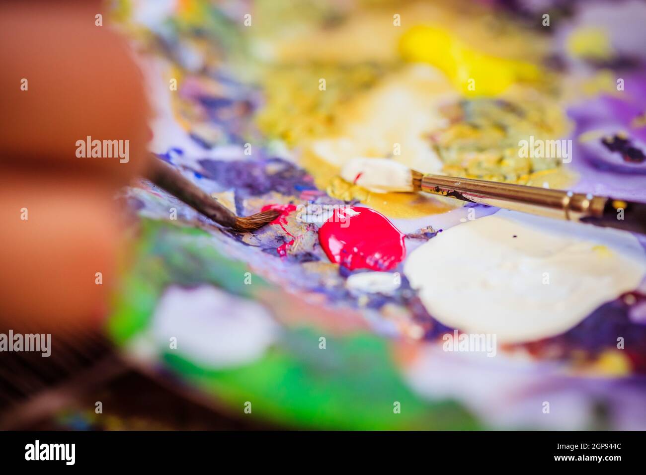 Artist paint brush on painting background. Painting therapy Stock Photo ...