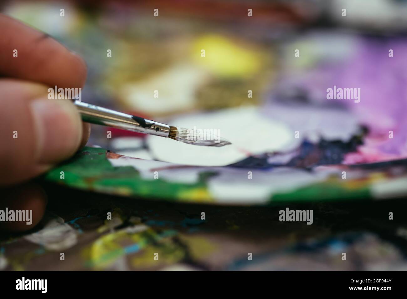 Artist paint brush on painting background. Painting therapy Stock Photo ...