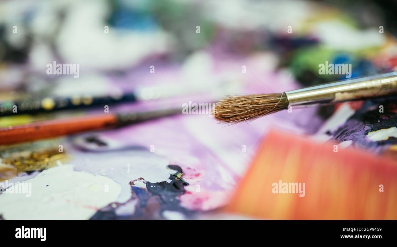 Artist paint brush on painting background. Painting therapy Stock Photo ...