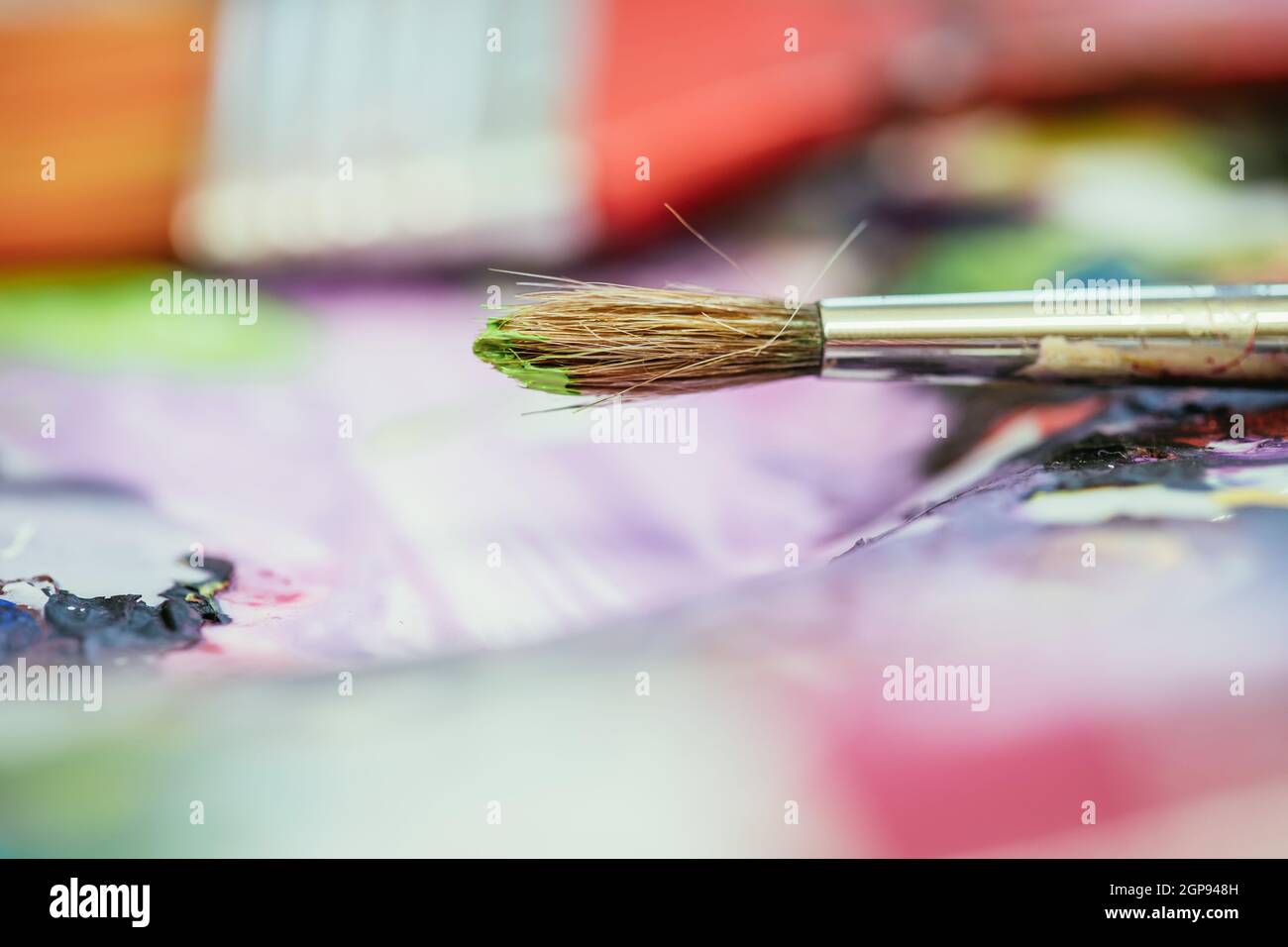 Artist paint brush on painting background. Painting therapy Stock Photo ...